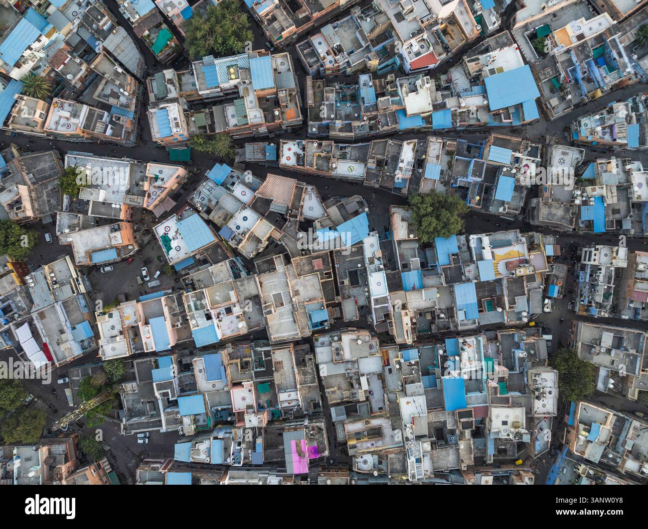 Aerial view of vibrant and colorful rooftops and buildings in a densely ...