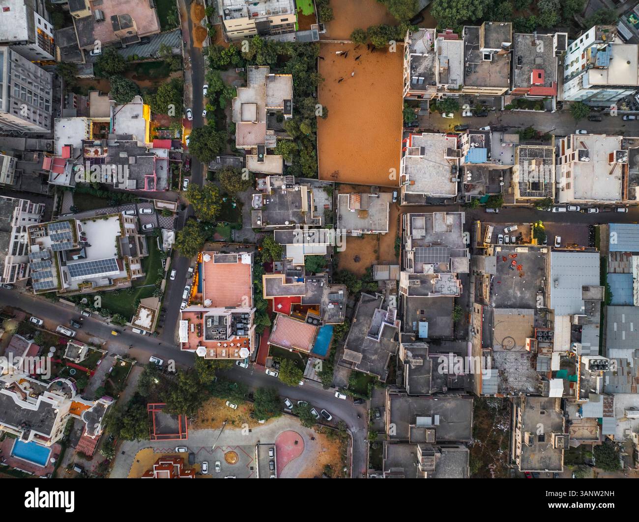 Aerial view of dense urban landscape with modern buildings and crowded ...