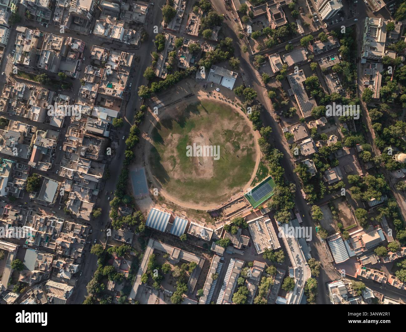Aerial view of beautiful urban landscape with stadium, residential ...