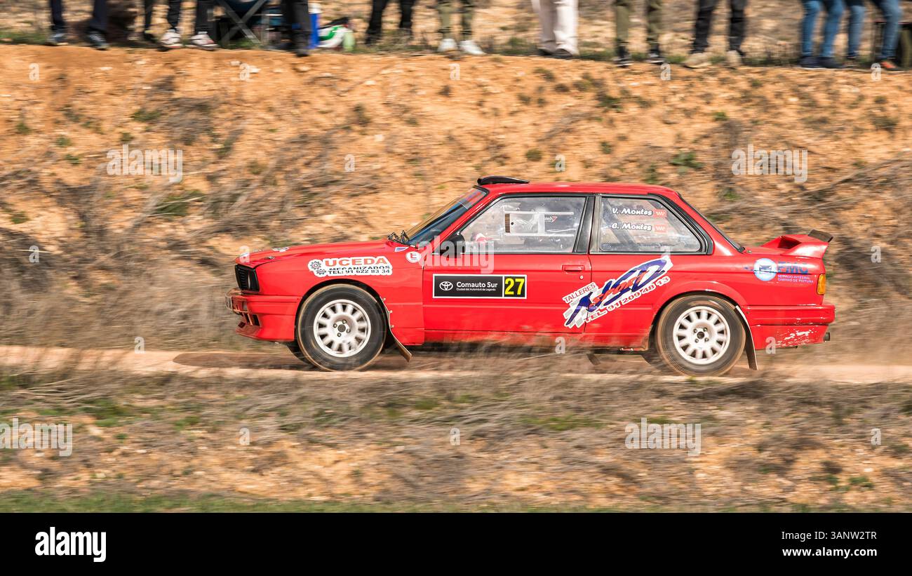 Madrid, Spain; 02-15-2025: Classic red BMW 325i E30 rally car competing ...