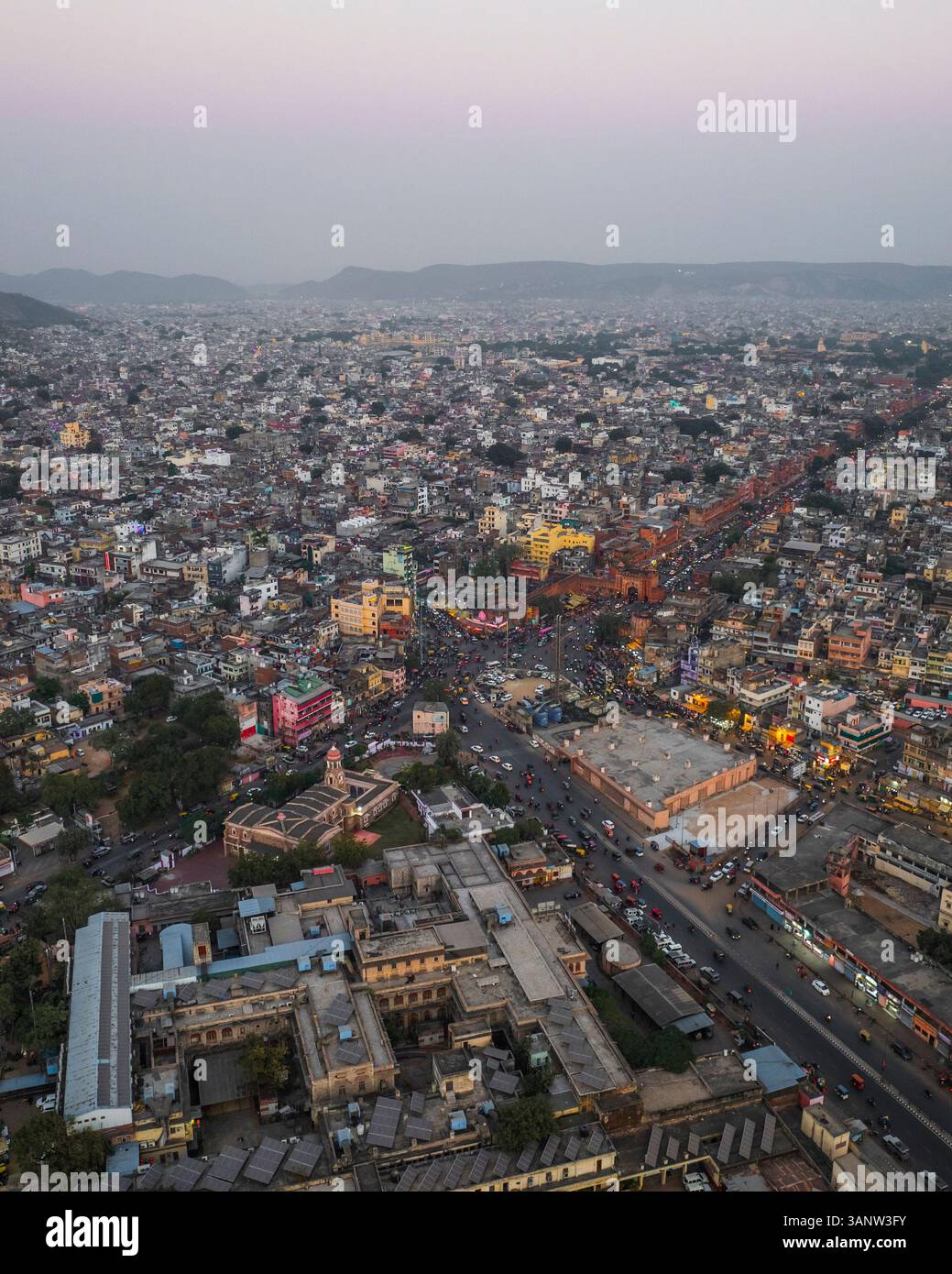 Aerial view of bustling cityscape with colorful buildings and busy ...