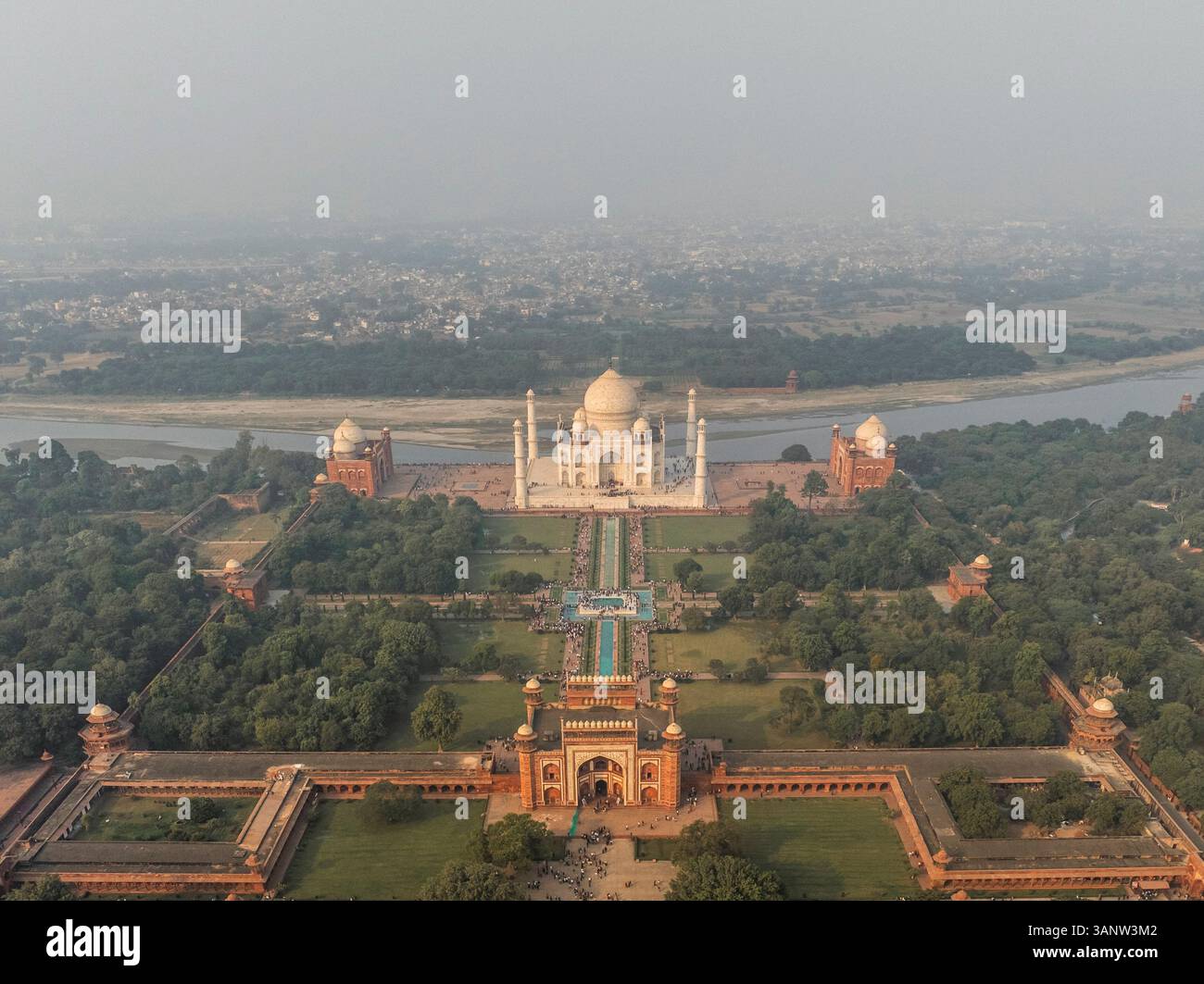 Aerial view of the beautiful Taj Mahal surrounded by gardens and a ...