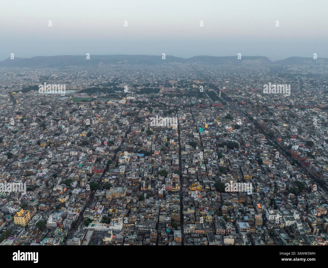 Aerial view of the expansive cityscape with dense residential districts ...