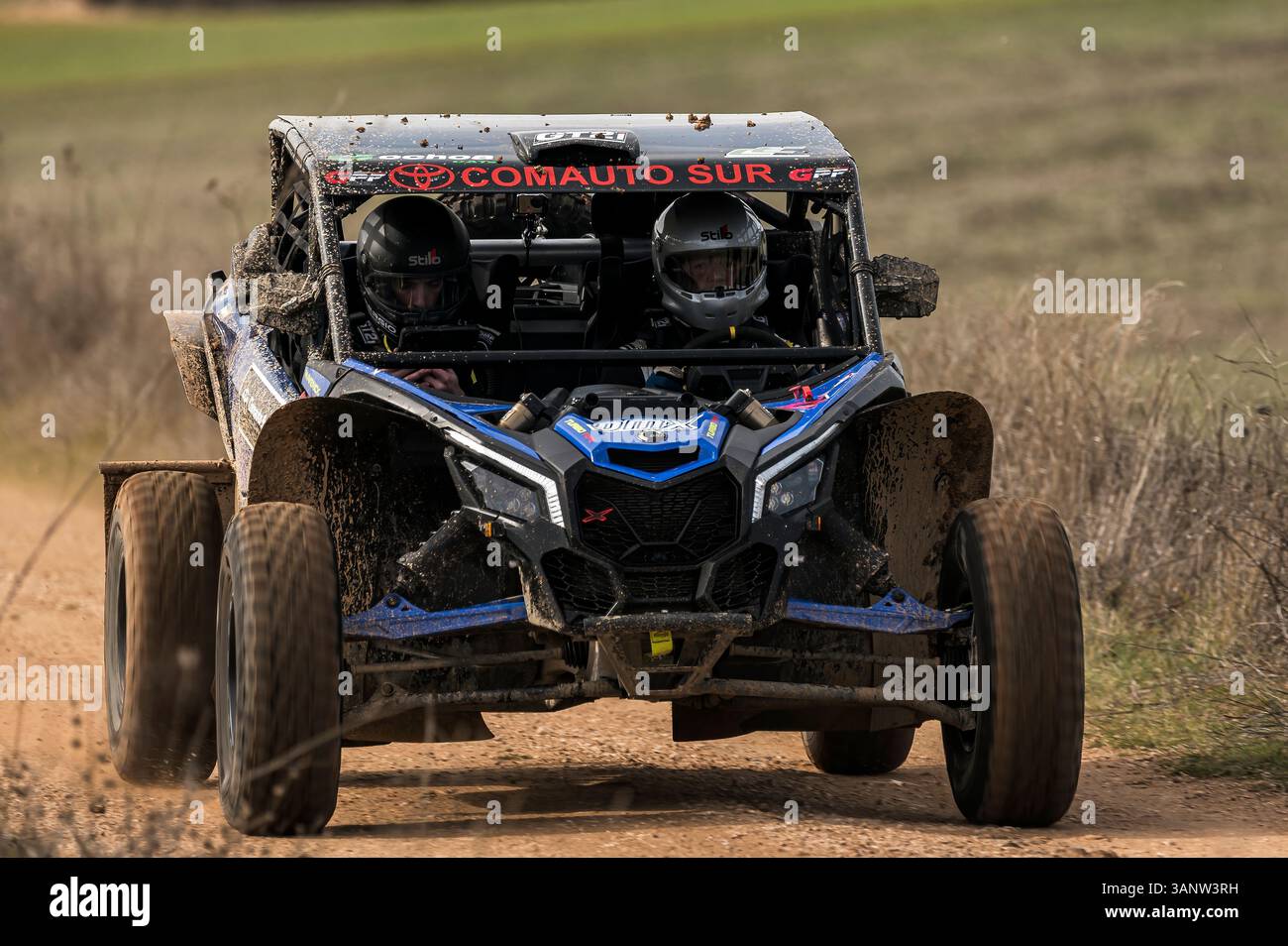 Madrid, Spain; 02-15-2025: Can-Am Maverick X3 buggy speeds on a dirt ...