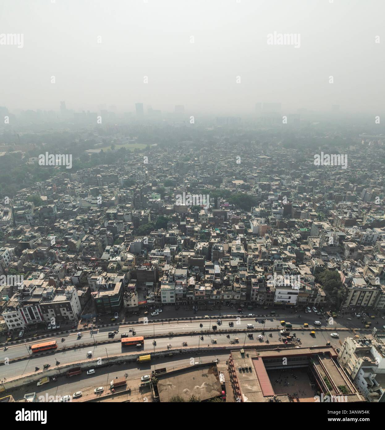 Aerial view of bustling urban landscape with dense buildings and busy ...