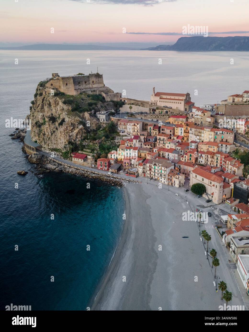 Aerial view of the picturesque seaside town with a historic castle on a ...
