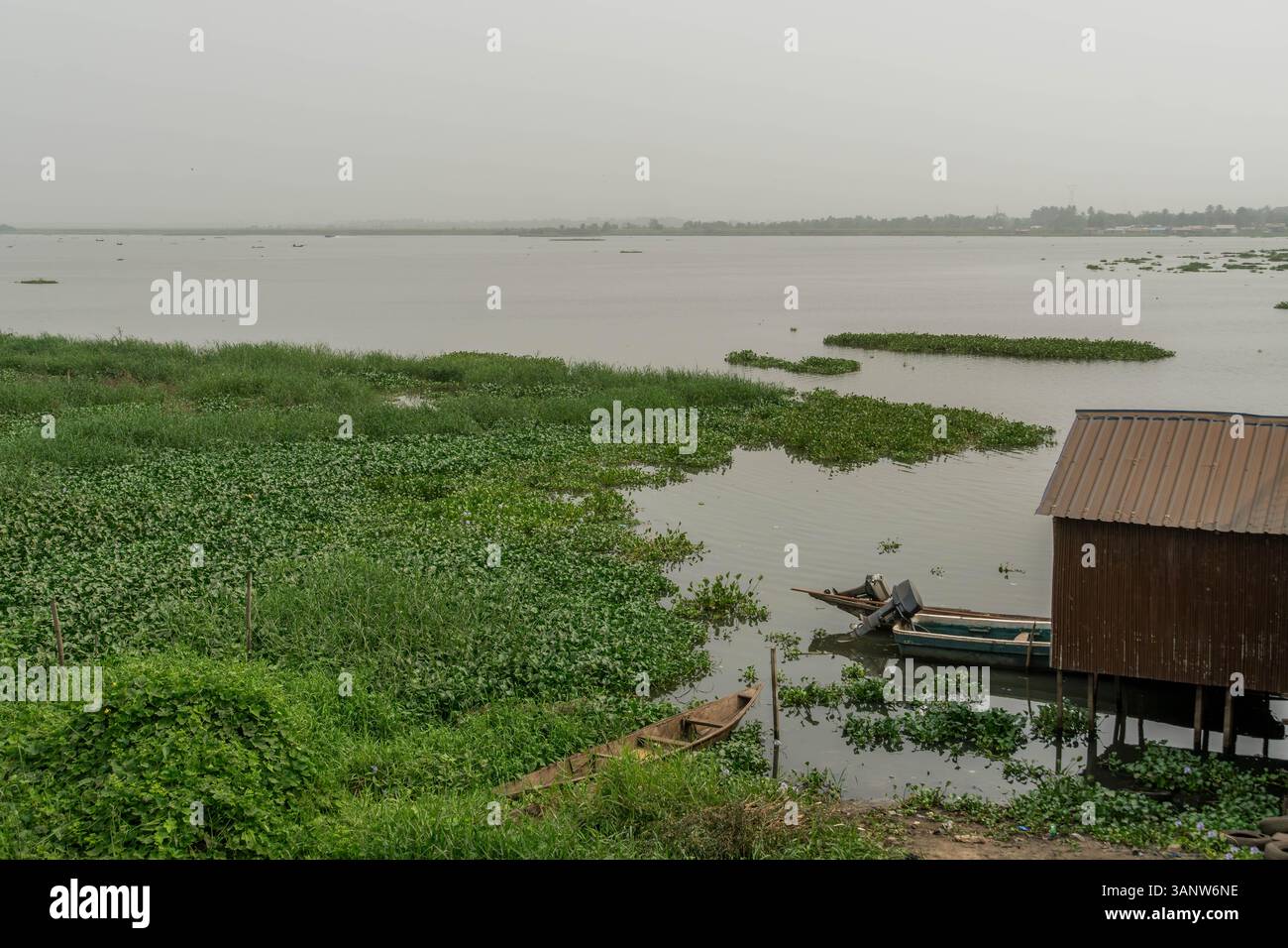 The view over Yewa river at Porto-Novo, Benin, with fisherman boats and ...