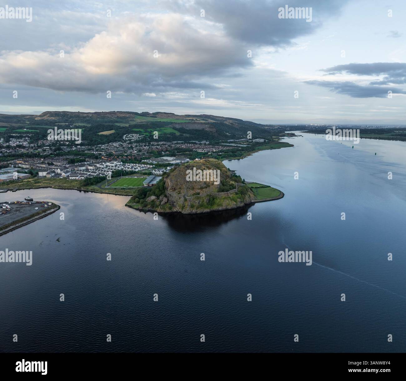 Aerial view of the scenic River Clyde with Dumbarton Castle and lush ...