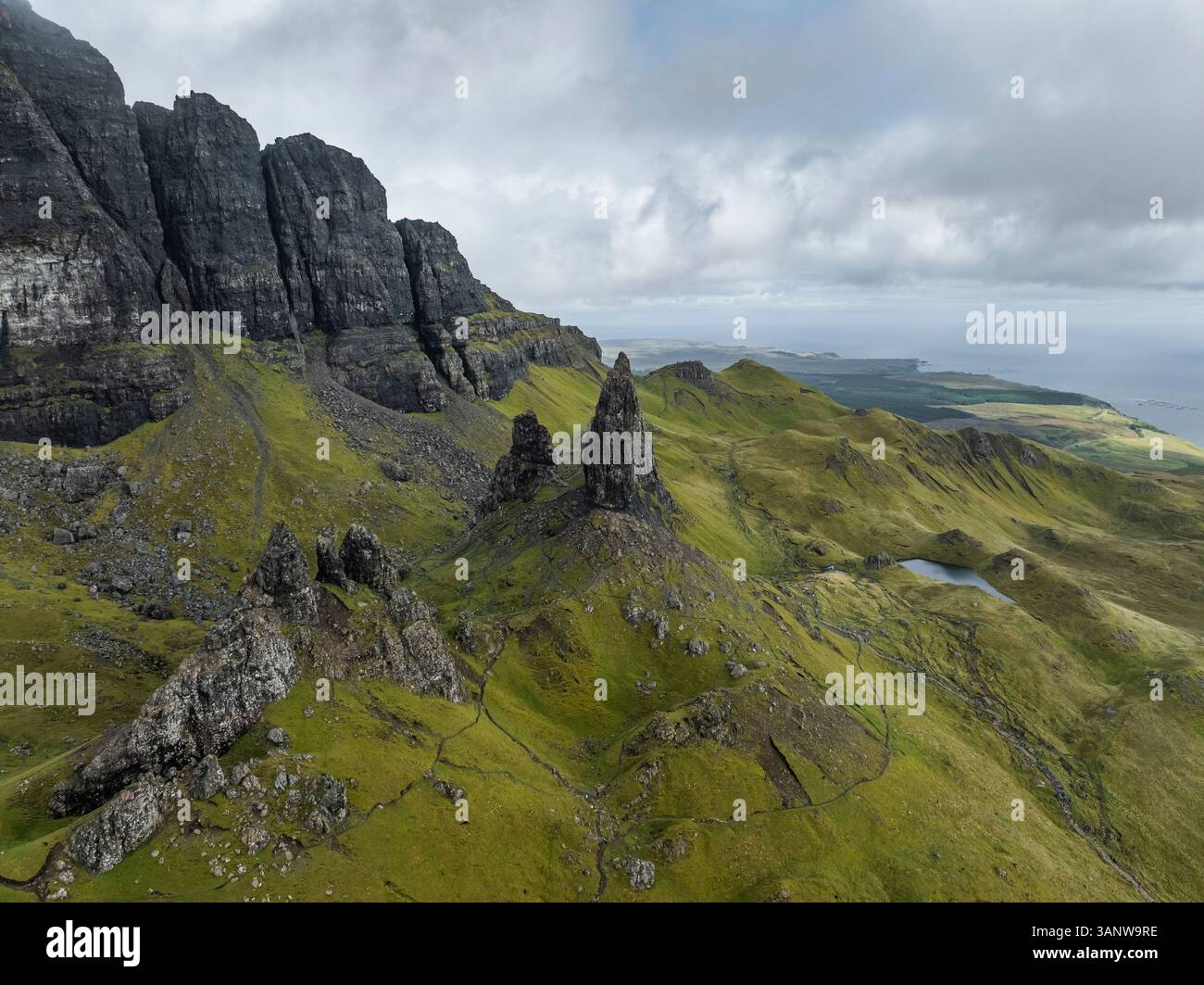 Aerial view of the majestic Old Man of Storr mountain amidst rugged ...