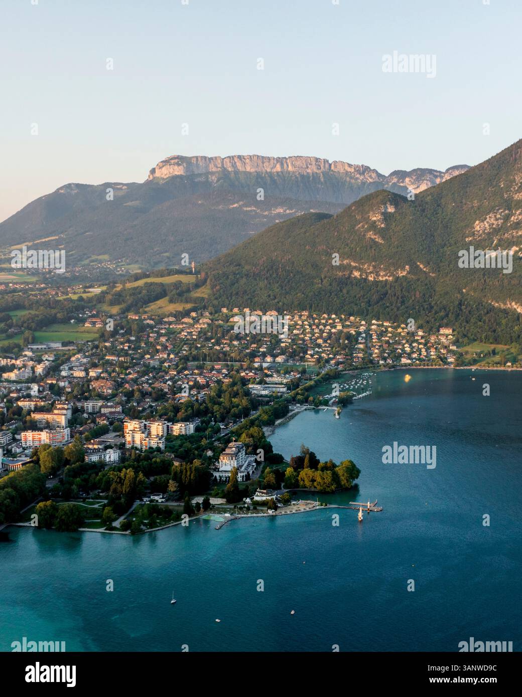 Aerial view of tranquil Annecy Lake surrounded by picturesque mountains ...