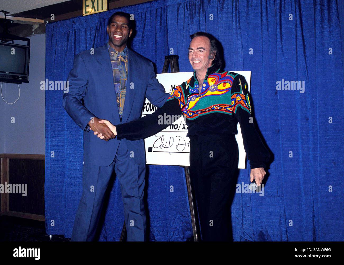 Nov. 17, 2005 - Neil Diamond and Ervin ''Magic'' Johnson. Lisa Rose ...