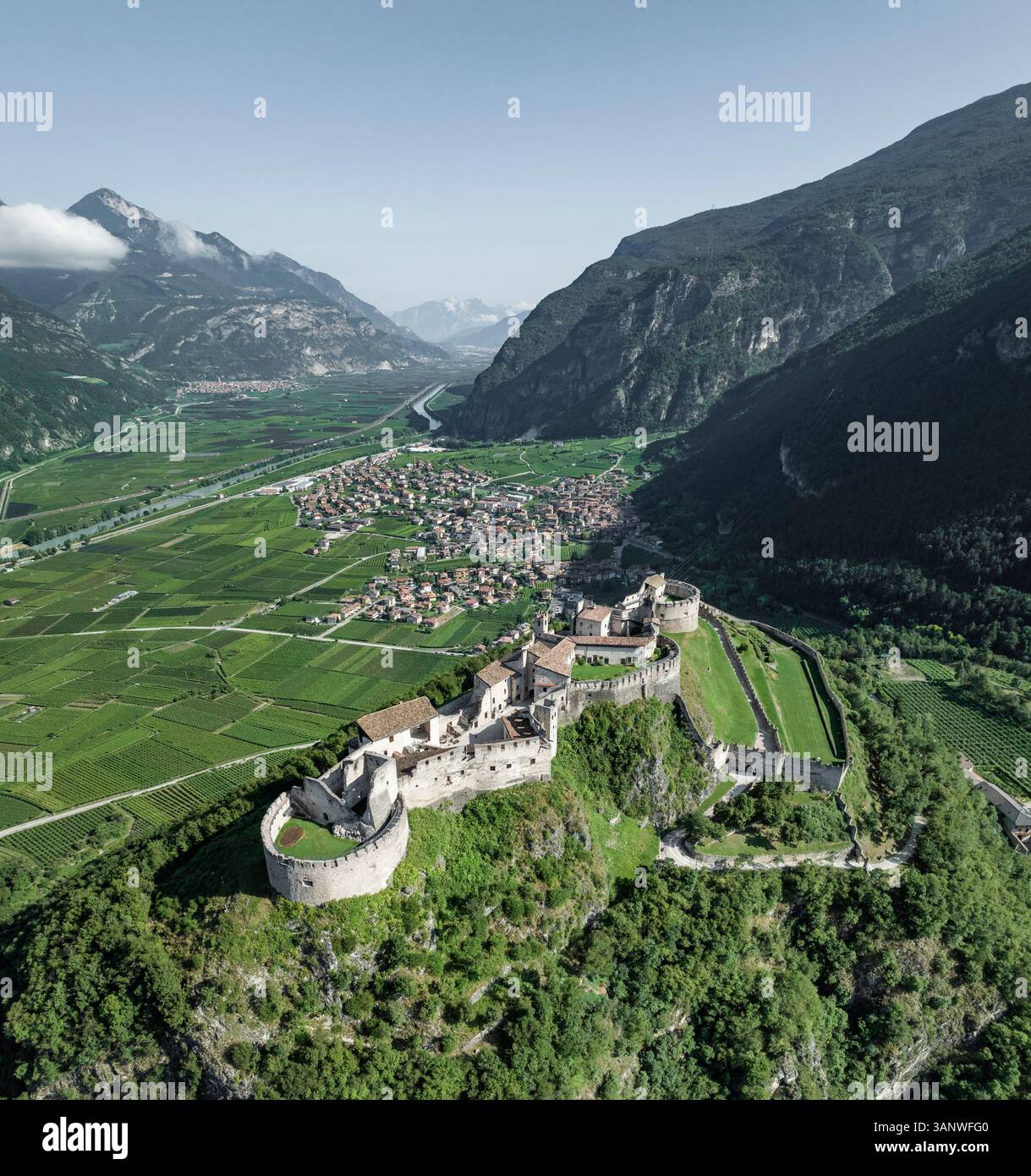 Aerial view of the majestic Castel Beseno surrounded by mountains and ...