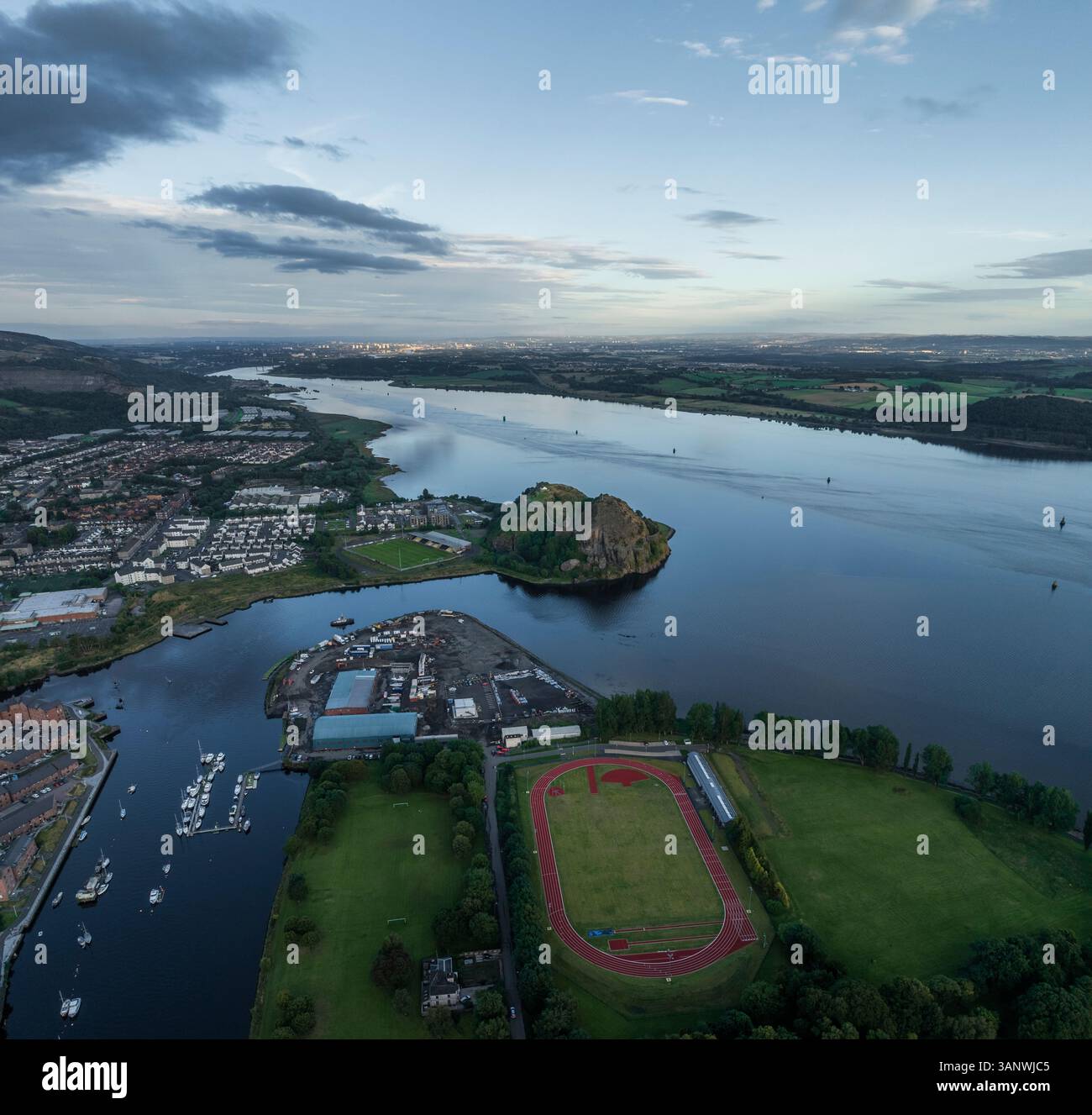 Aerial view of the scenic River Clyde with Dumbarton Castle and ...