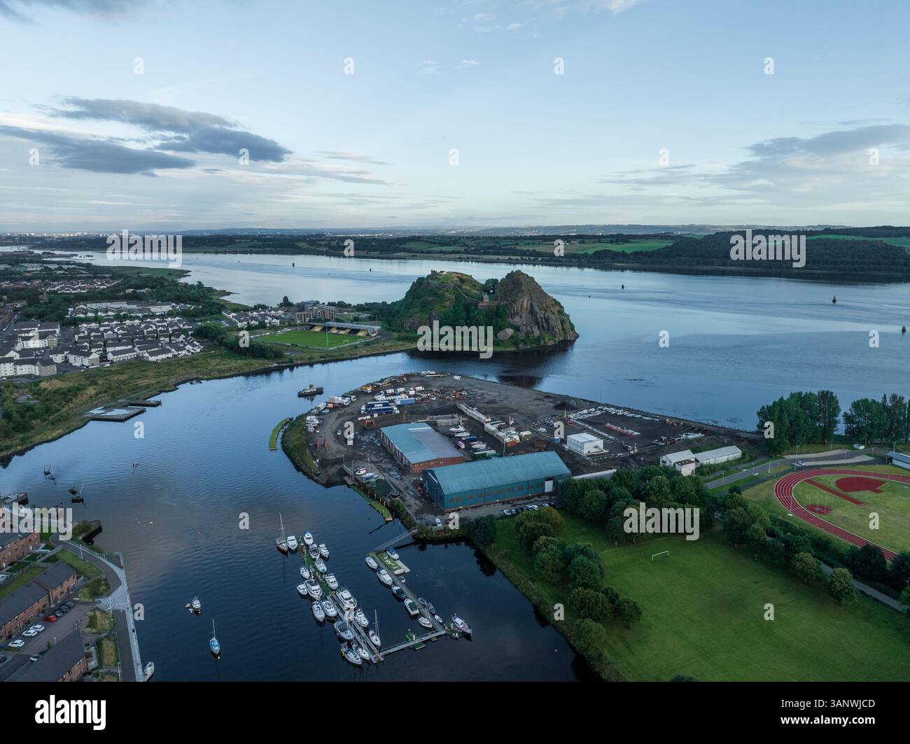 Aerial view of the serene River Clyde with Dumbarton Castle and ...