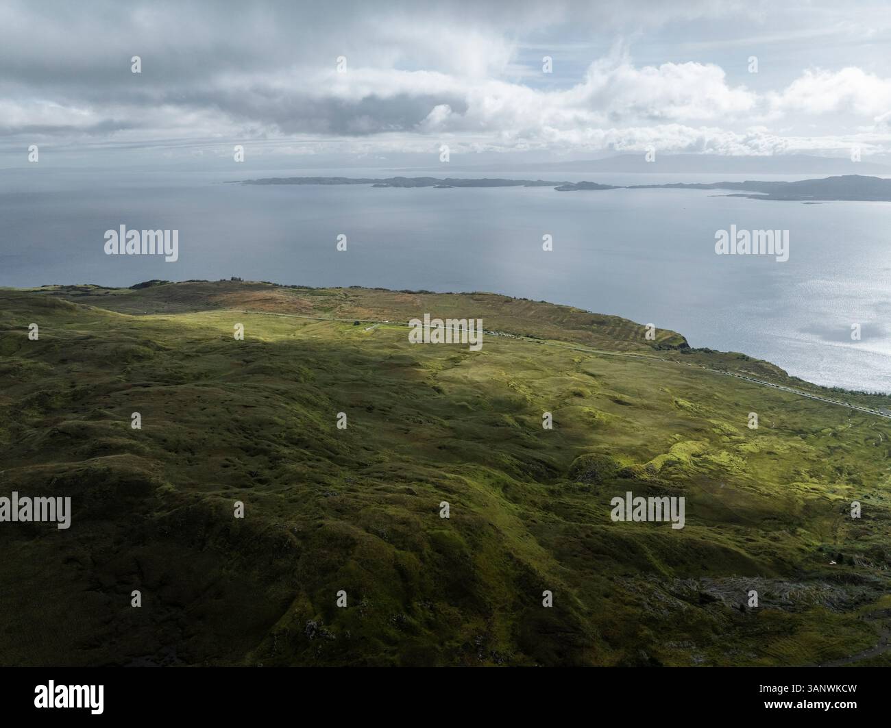 Aerial view of the majestic Old Man of Storr amidst rugged hills and a ...