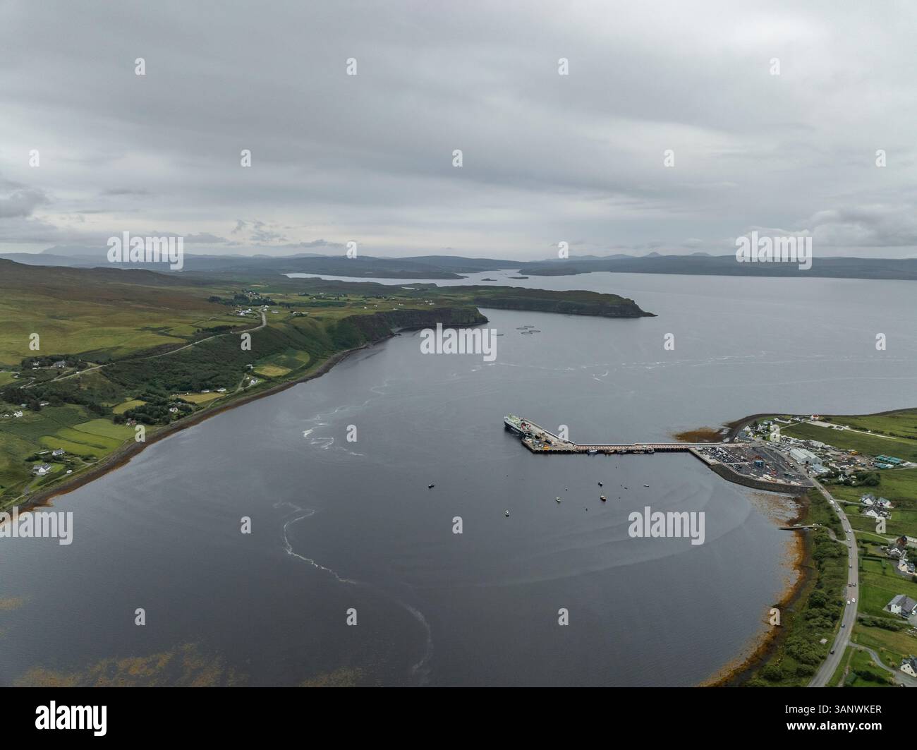 Aerial view of the picturesque bay and tranquil village surrounded by ...