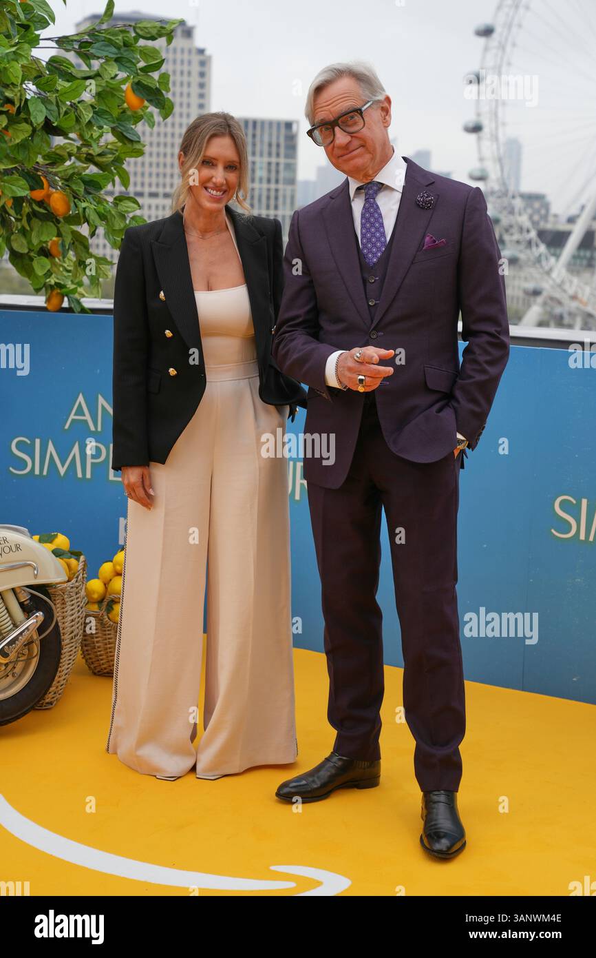Producer Laura Fischer, left, and director Paul Feig pose for ...