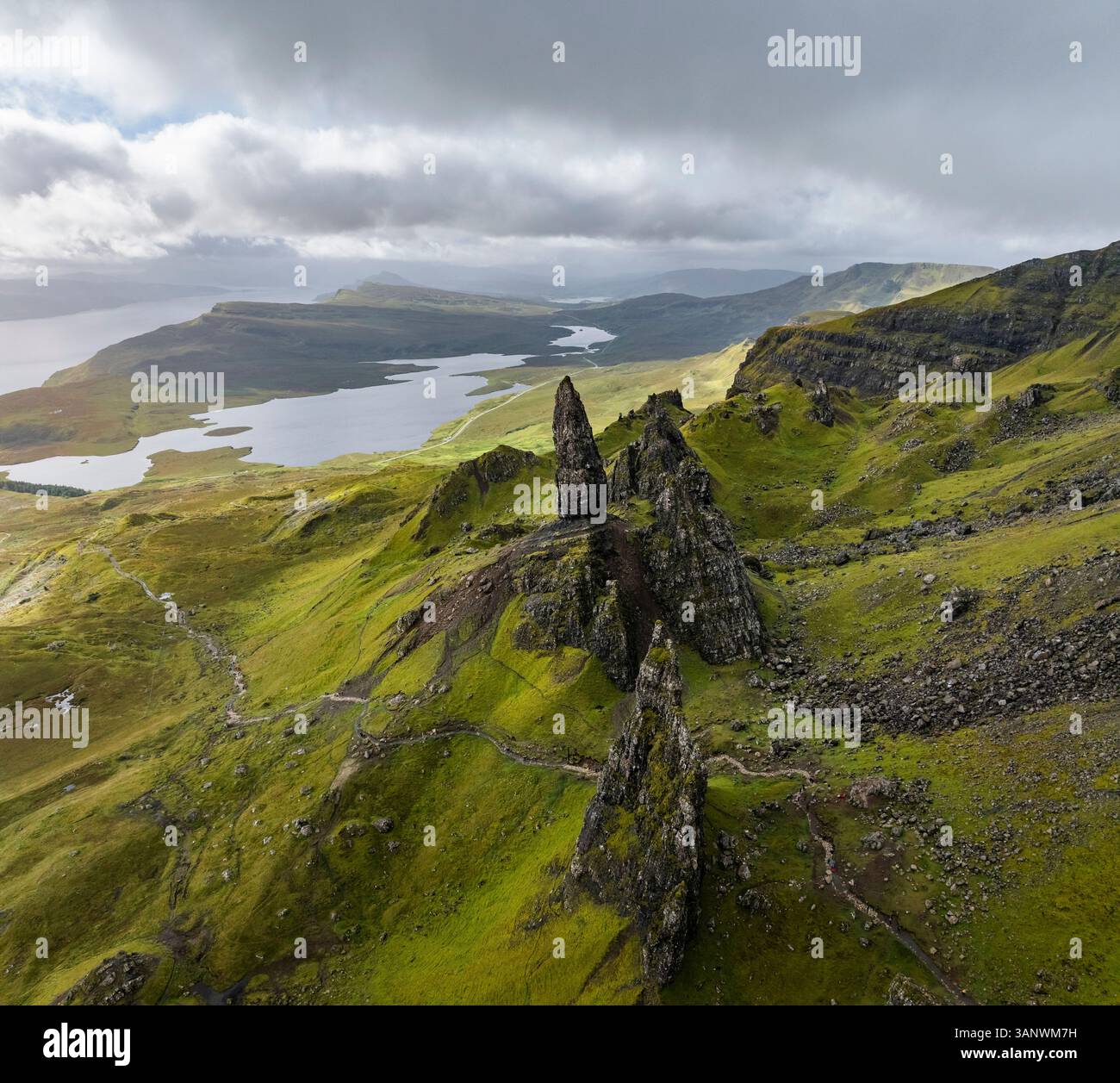Aerial view of the iconic Old Man of Storr rock formation amidst rugged ...