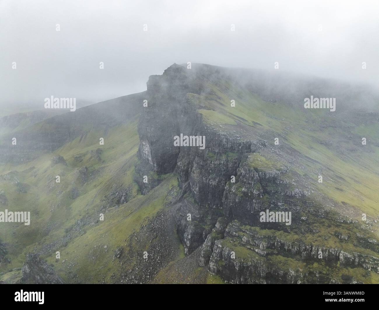 Aerial view of the majestic Old Man of Storr rock formation surrounded ...