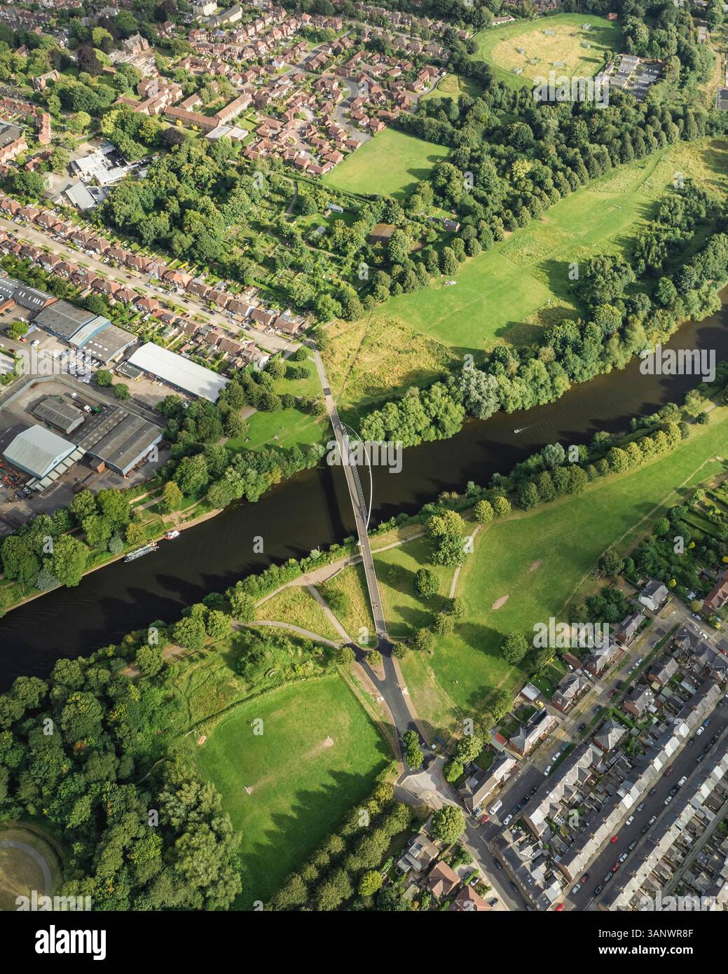 Aerial view of the tranquil River Ouse surrounded by lush greenery and ...