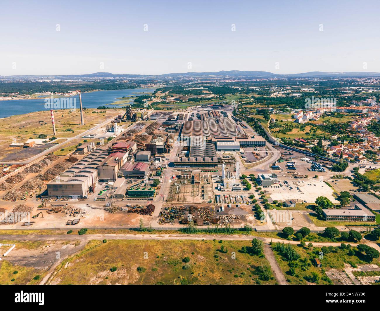 Aerial view of a giant quarry and construction site at Ecometais, a ...