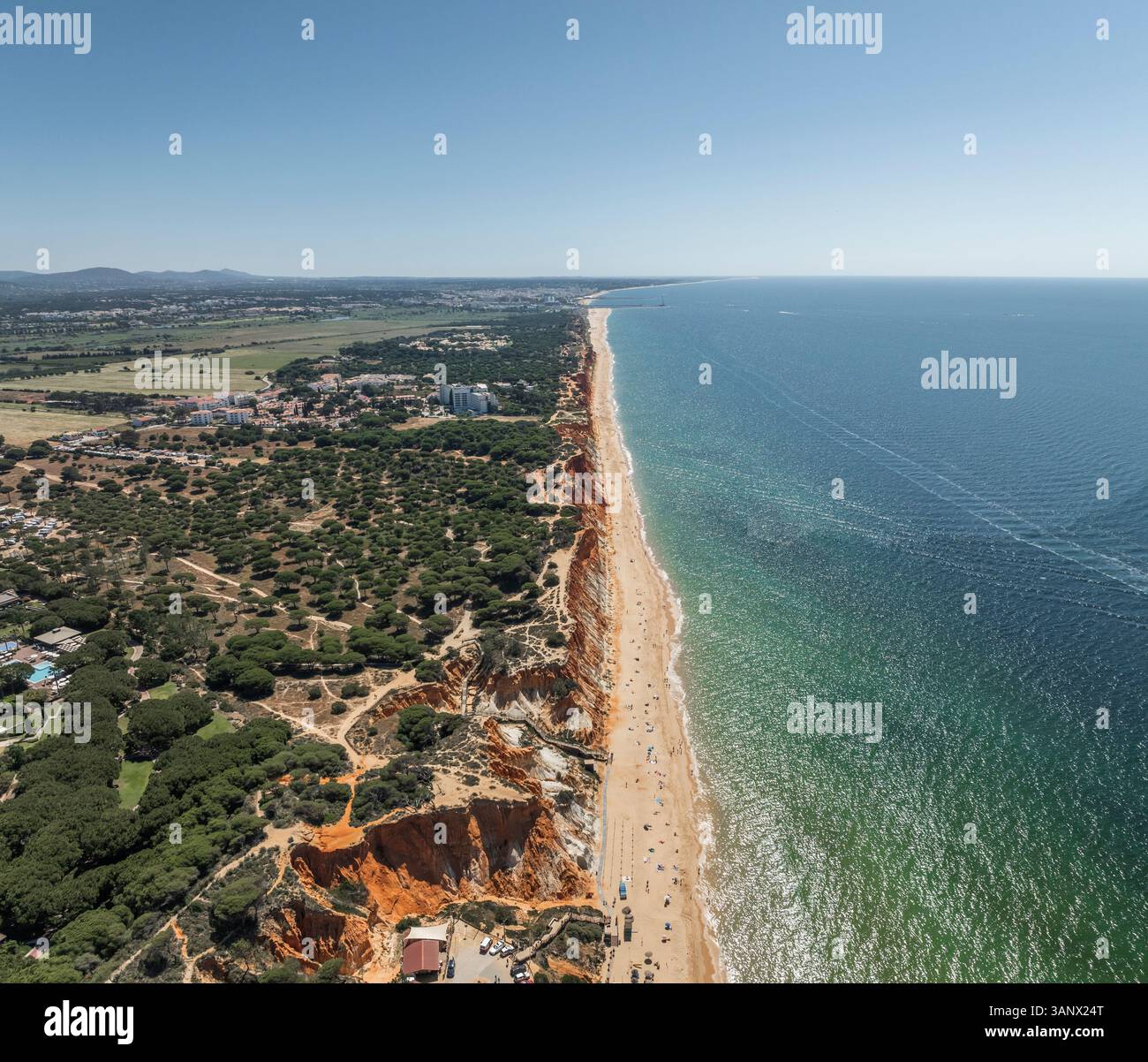 Aerial view of beautiful Praia da Falesia beach, Olhos de Agua, Algarve ...