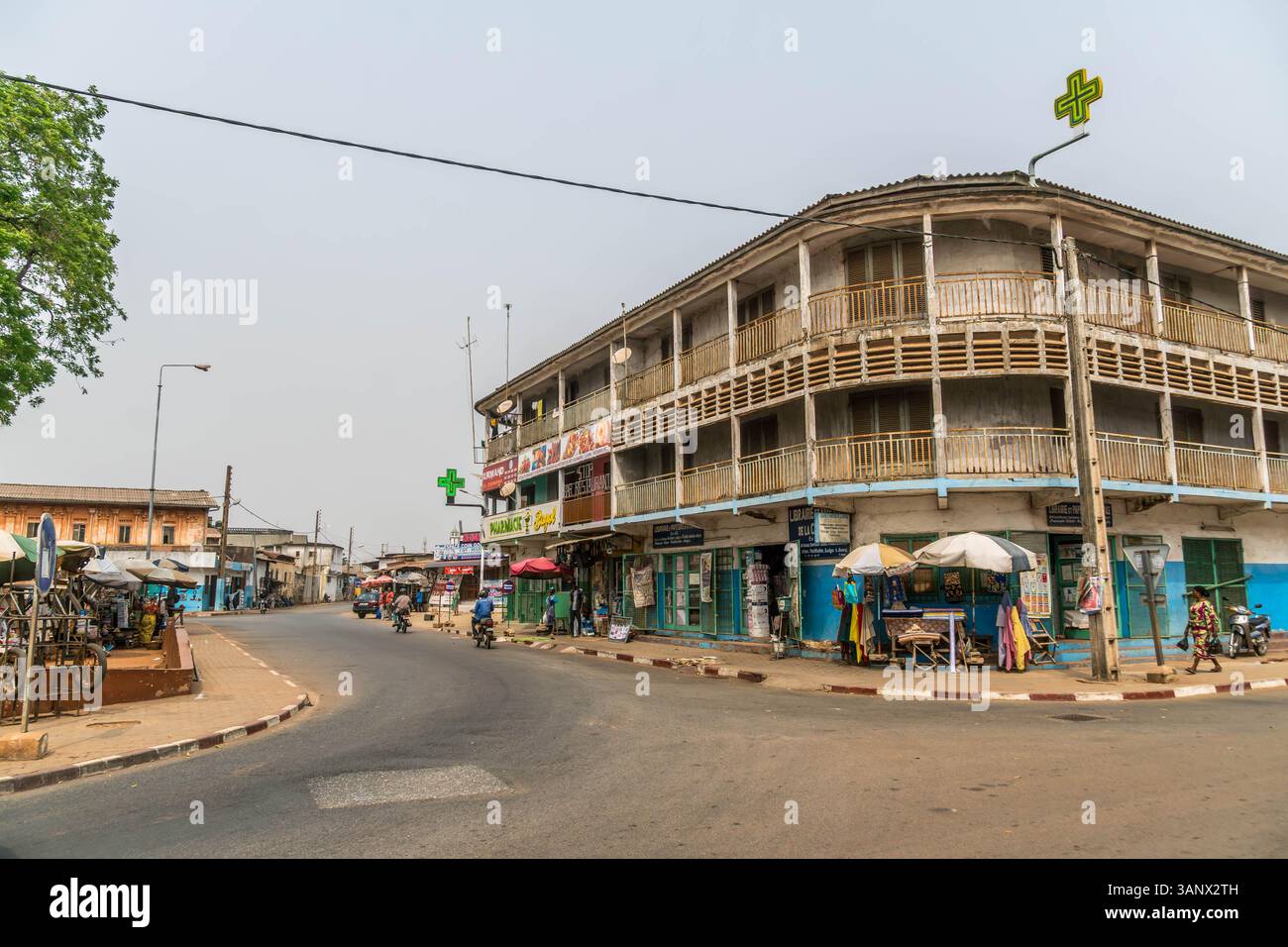 Old Portuguese colonial building in Porto-Novo, with aged balconies and ...