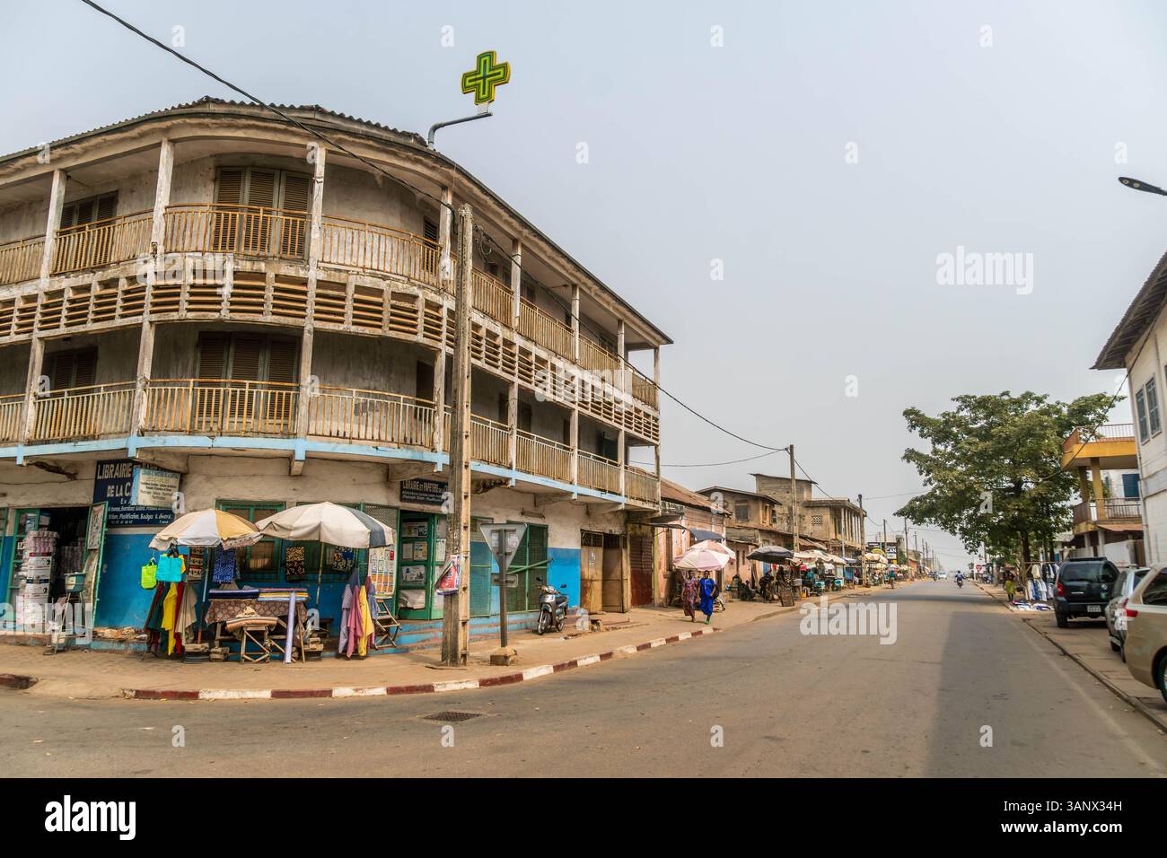 Old Portuguese colonial building in Porto-Novo, with aged balconies and ...