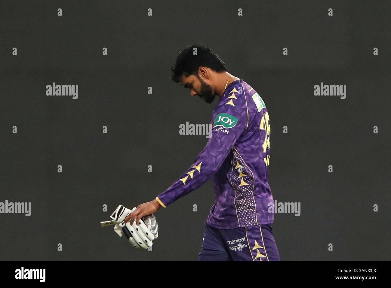 Kolkata Knight Riders' Venkatesh Iyer walks off the field after losing ...