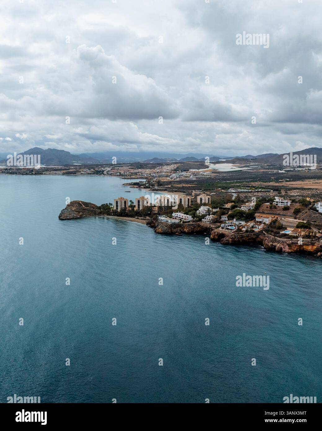 Aerial view of coastal cliffs and Mediterranean Sea, Isla Plana, Murcia ...
