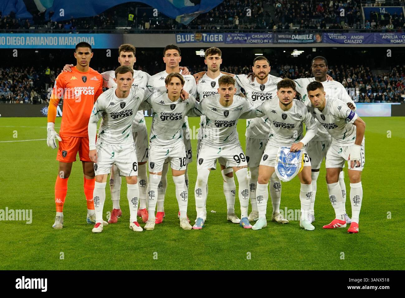 Naples, Italy. 14 Apr, 2025. Players of Empoli FC line up for a team ...