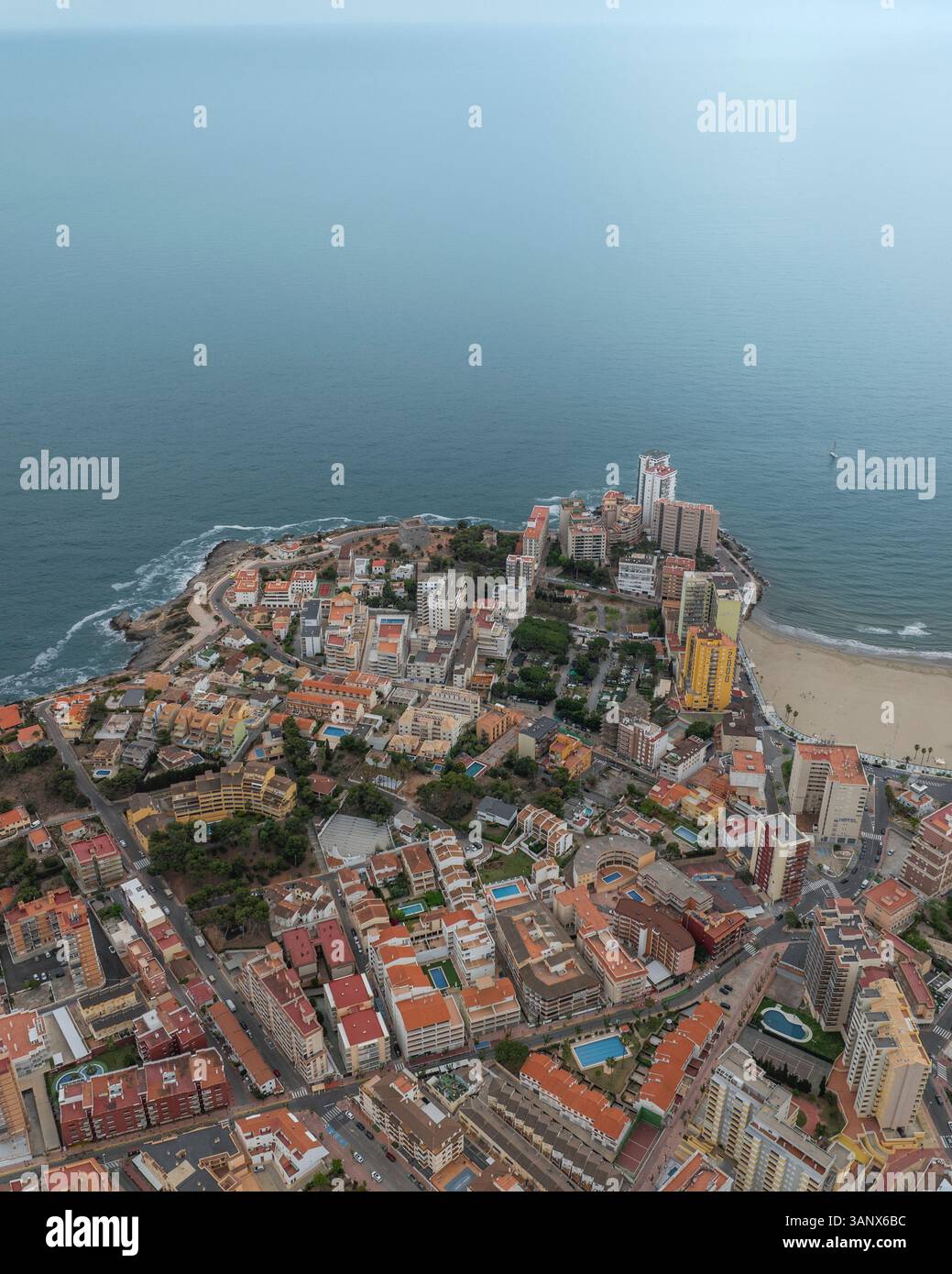 Aerial view of beautiful coastal town at sunset, Oropesa del Mar ...
