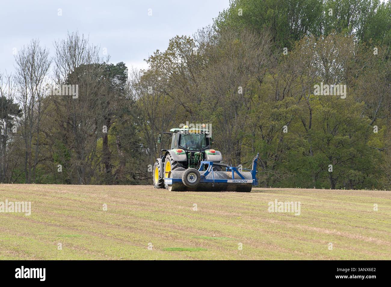 Kingsclere, West Berkshire, UK. 14th April, 2025. A farmer at work in a ...
