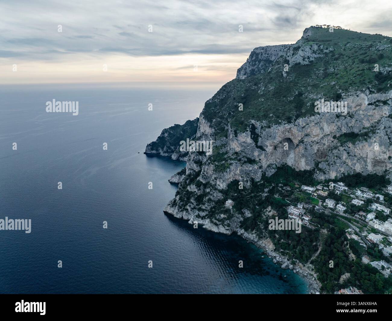 Aerial view of coastal shapes and patterns at sunset, Capri Island ...