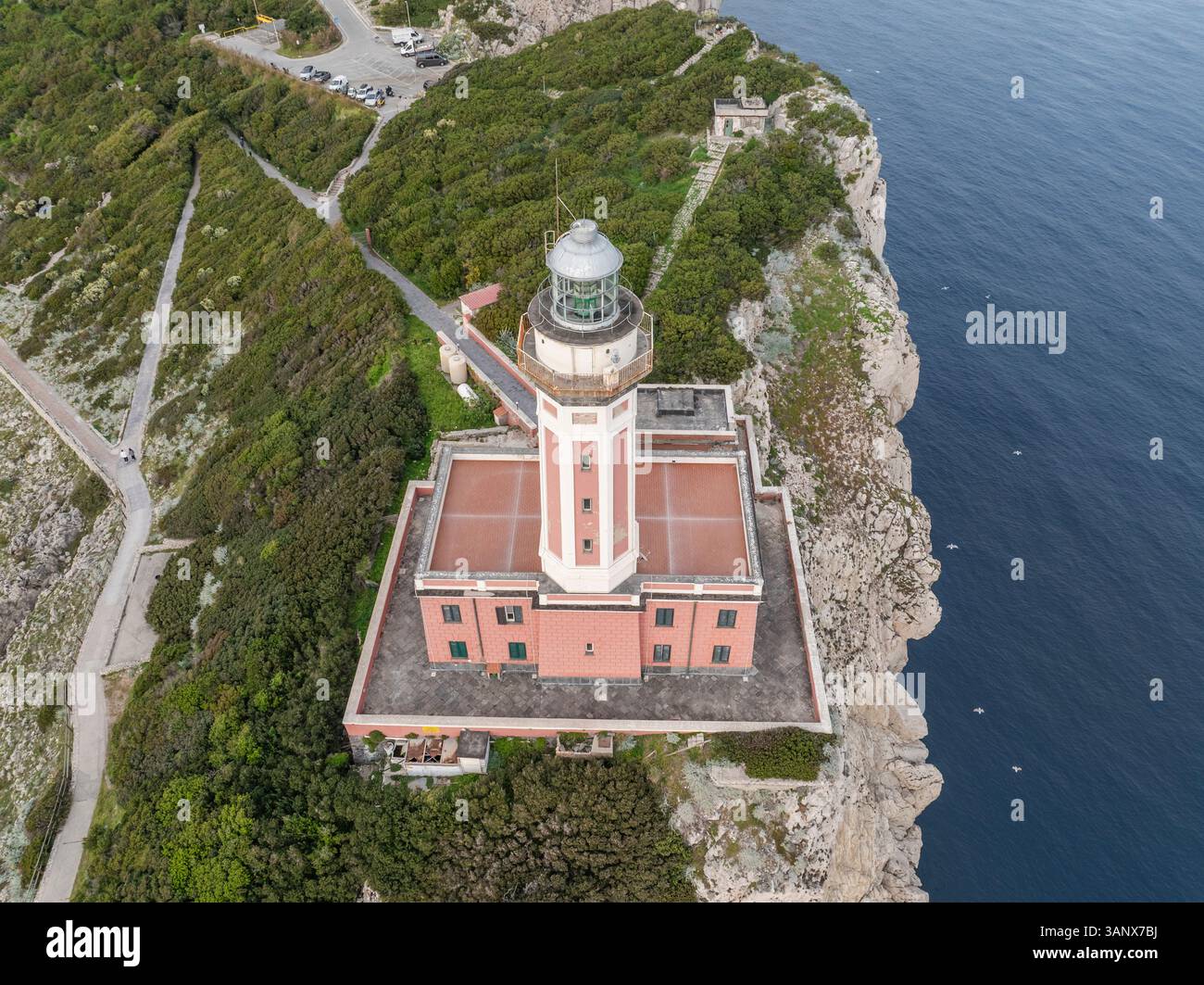 Aerial view of Punta Carena Lighthouse overlooking Capri Island, Naples ...