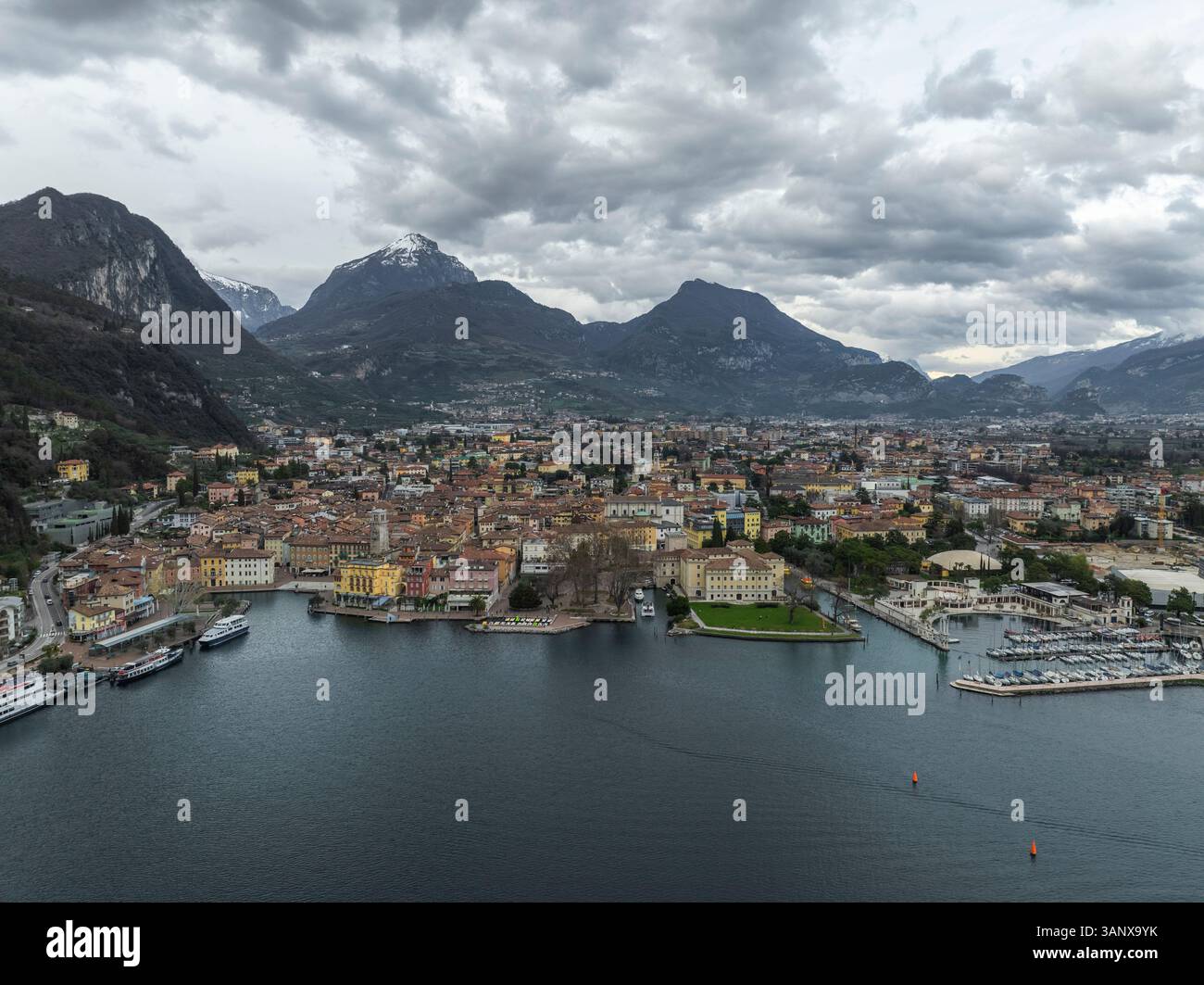 Aerial view of Riva del Garda with beautiful architecture and coastline ...
