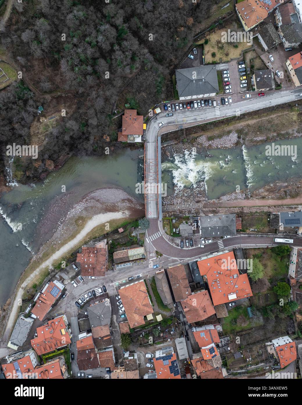 Aerial view of Lavis, Trento, Avisio river, and creek with beautiful ...