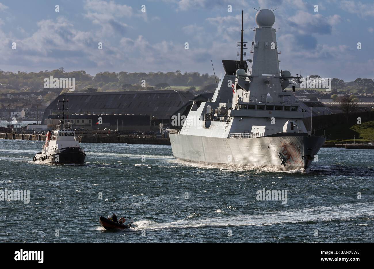 The Type 45 destroyer HMS Dragon leaving her base port of Devonport ...