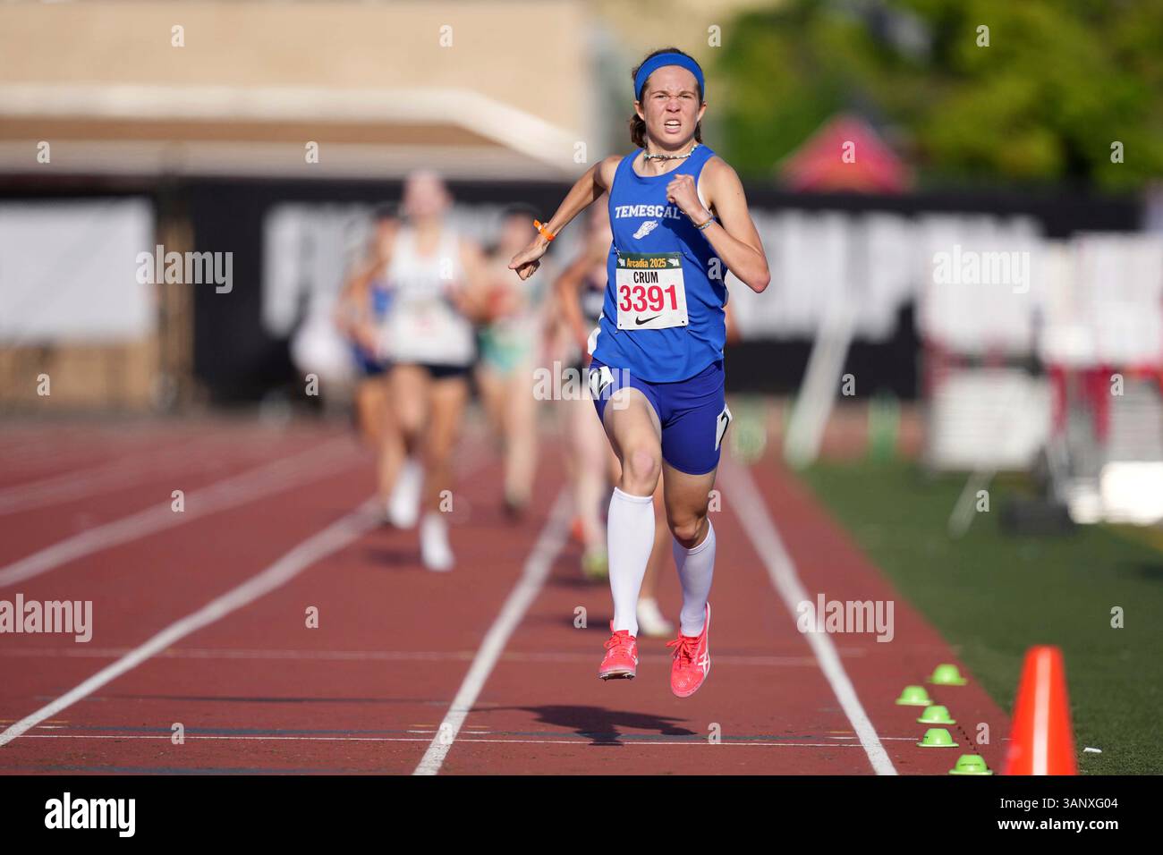 Megan Crum (3391) of Temescal Canyon wins the seeded girls mile in 4:53 ...