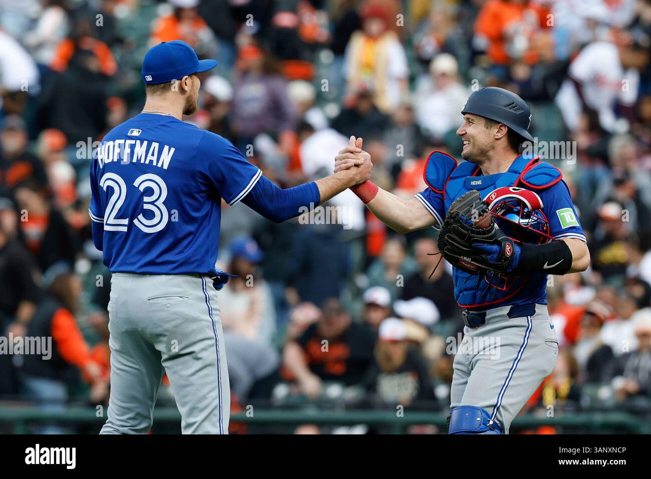 Toronto Blue Jays pitcher Jeff Hoffman (23) greets catcher Tyler ...
