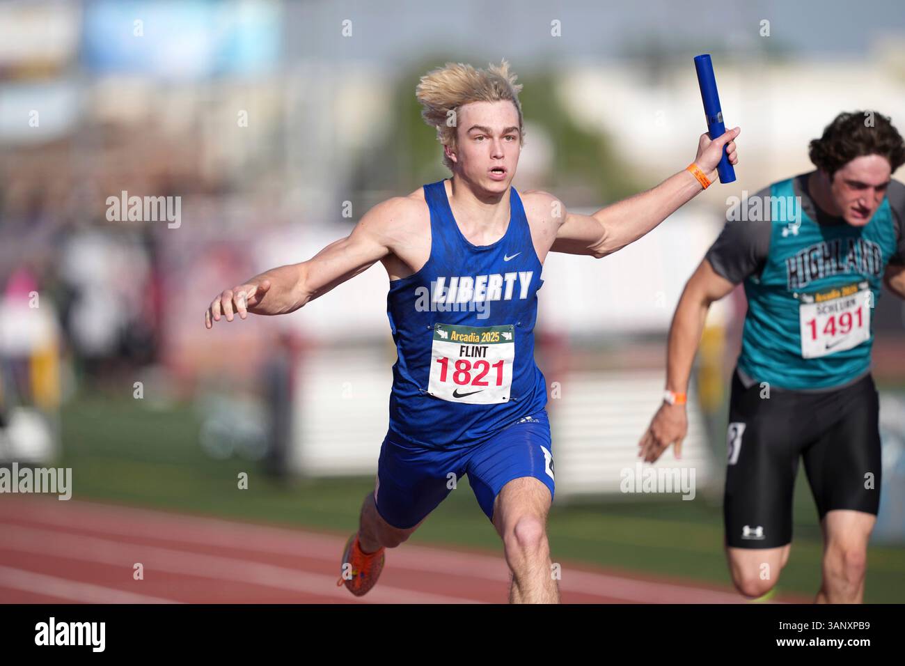 Sutton Flint (1821) runs the anchor leg on the Liberty (WA) 4 x 100m ...