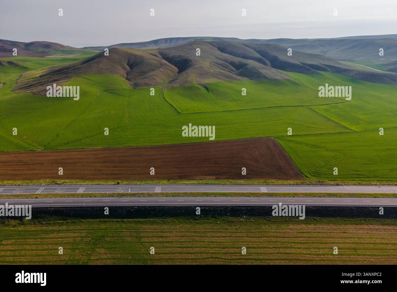 Aerial view of an empty highway along the hills in Central Anatolia ...