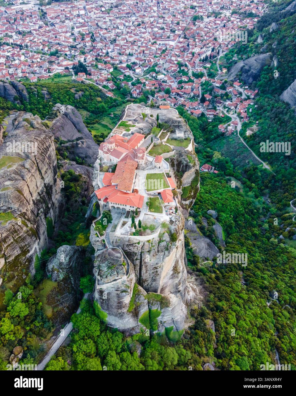 Aerial view of The Holy Trinity Orthodox Monastery with Kalabaka town ...