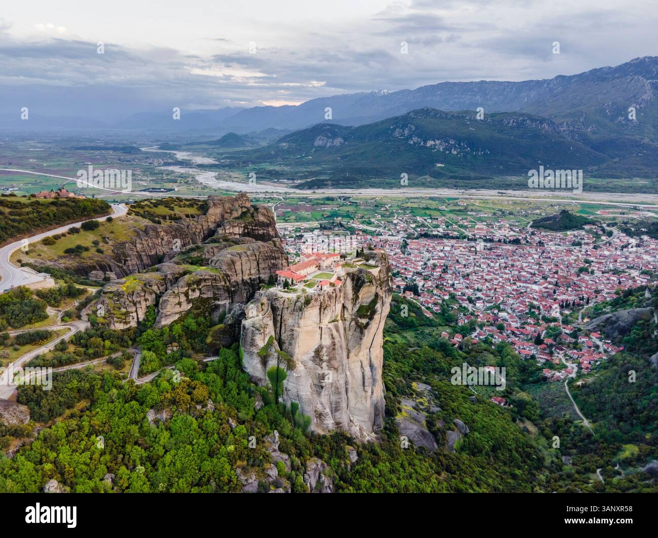 Aerial view of The Holy Trinity Orthodox Monastery with Kalabaka town ...