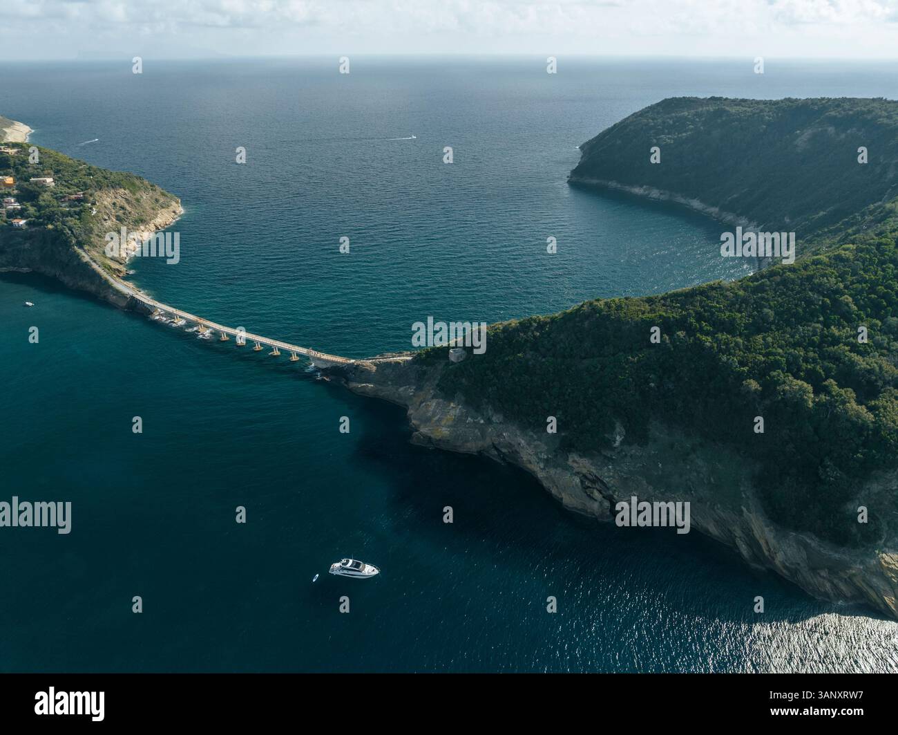 Aerial view of a sailboat moored in front of Vivara island natural ...