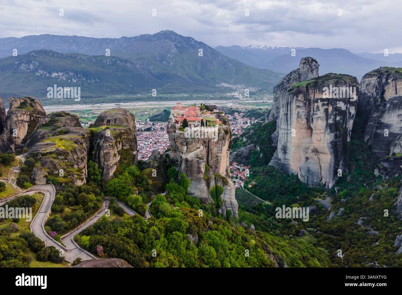 Aerial view of The Holy Trinity Orthodox Monastery with Kalabaka town ...