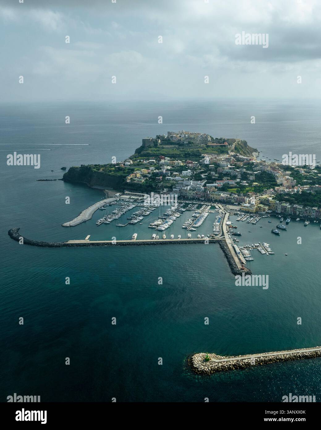 Aerial view of the harbour and the port in Procida Island, Flegree ...