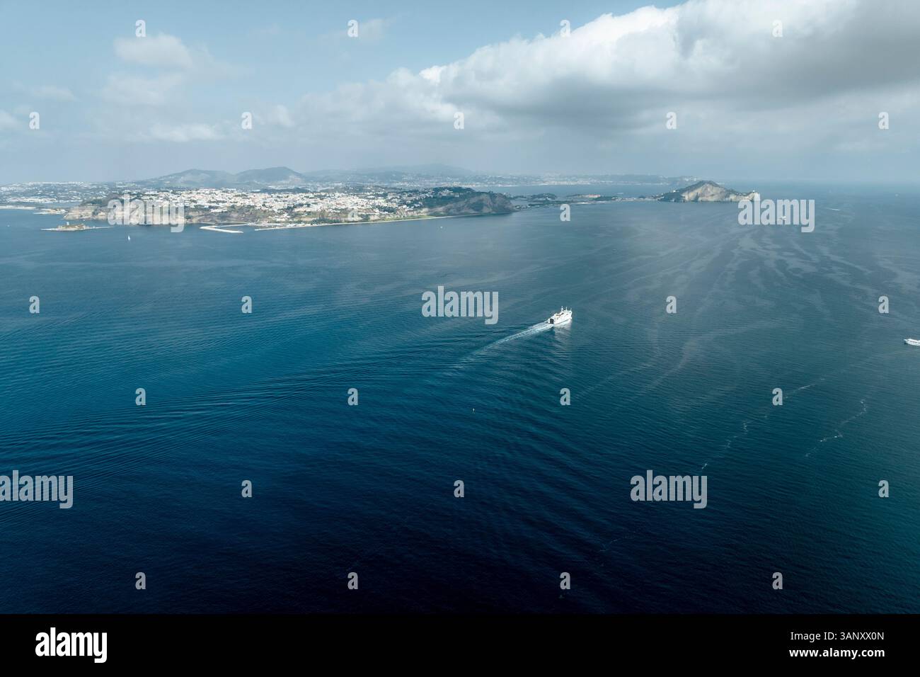 Aerial view of a ferry crossing the Gulf of Naples from Procida Island ...