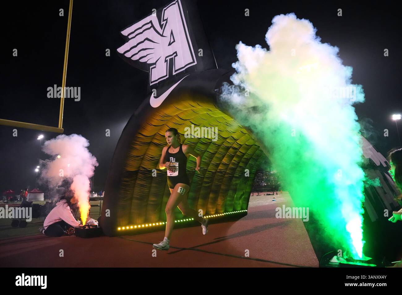 Annie Ivarrson (997) of Dana Hills enters the track during the 57th ...