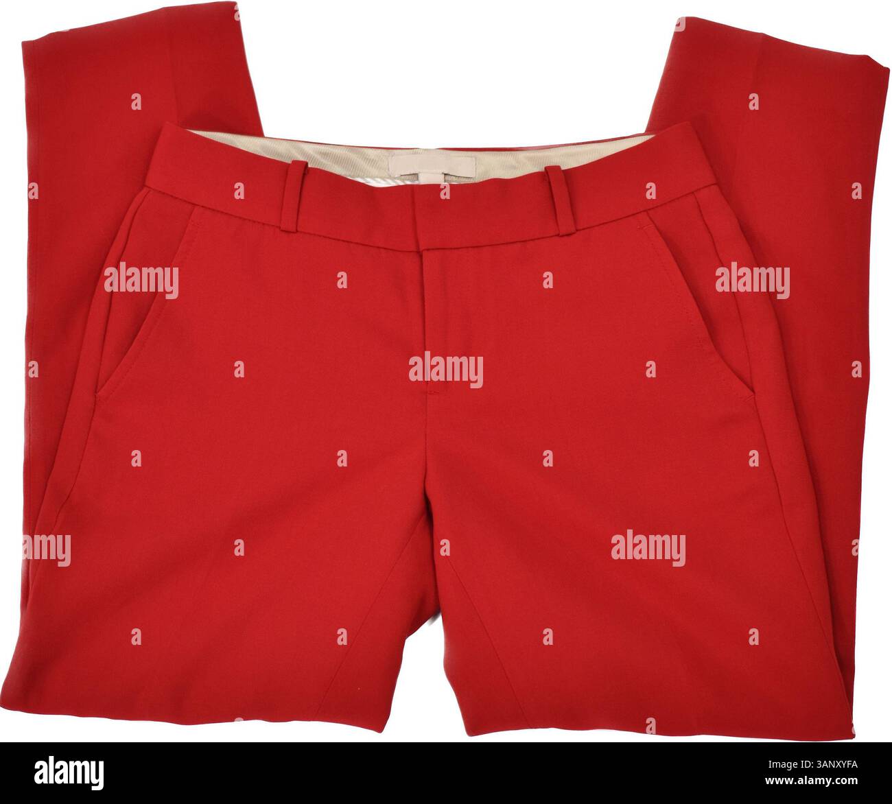 Classic red women work pants folded on white table minimal fashion ...